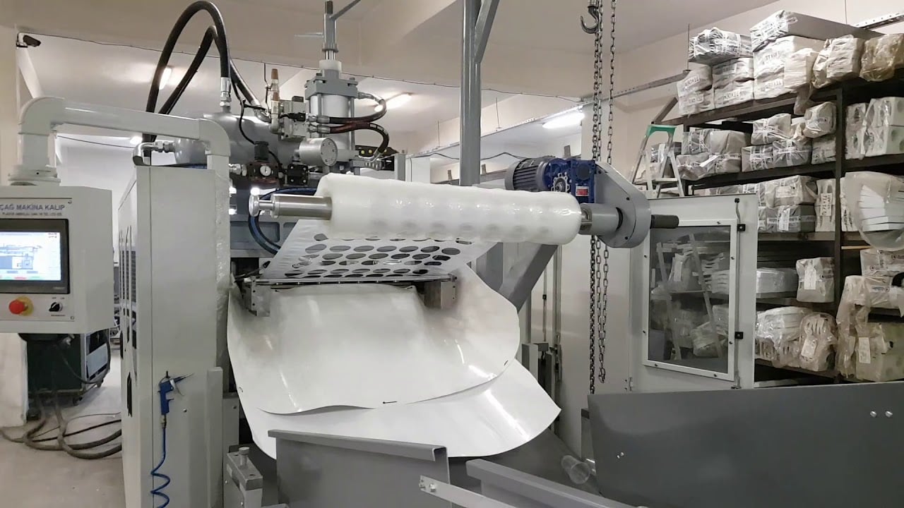 Watch This Factory Machine Spit Out Hundreds of Plastic Cups