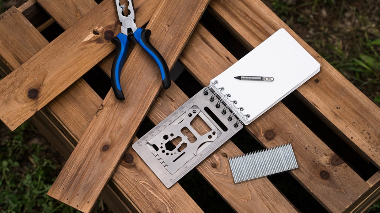 TIX Note Titanium Notebook Handles Rain and Mud and Even Opens Bottles