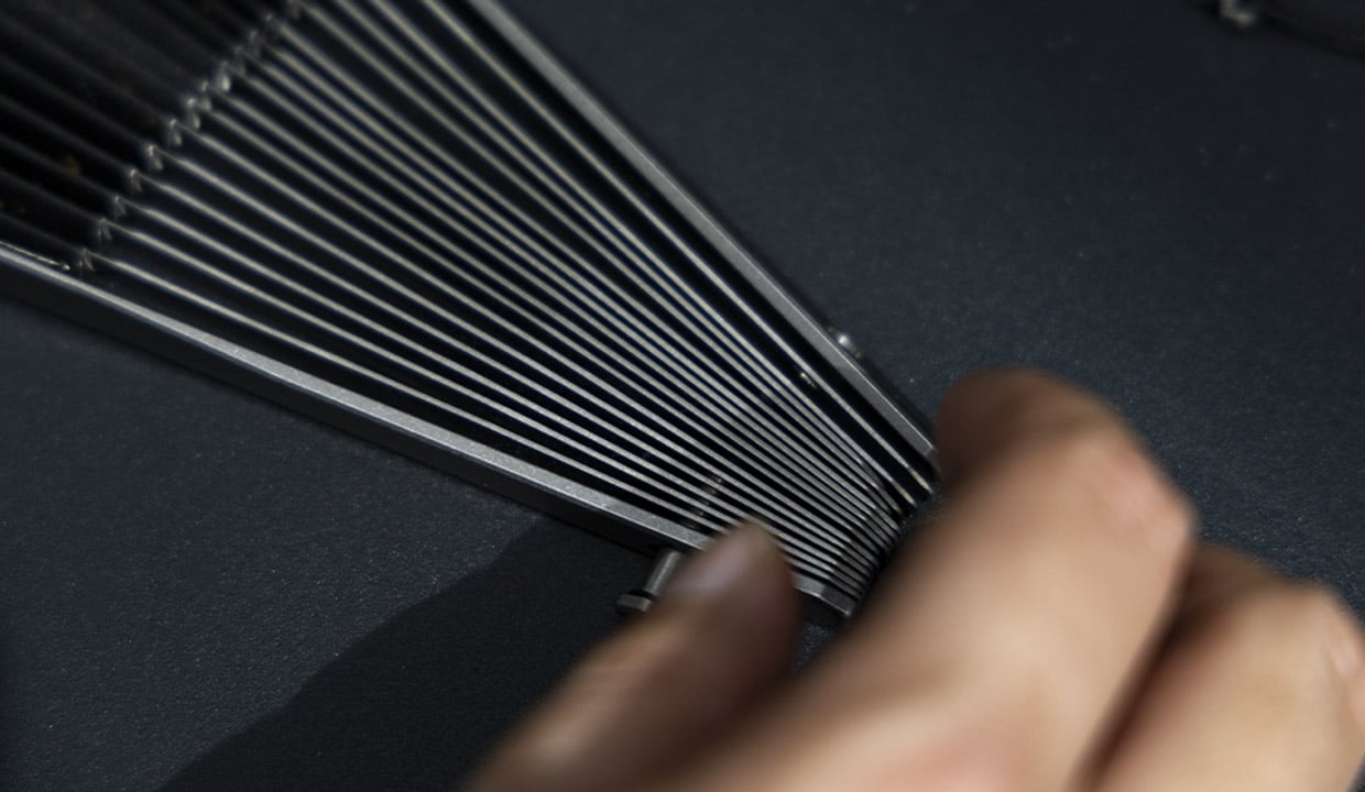 This Titanium Folding Fan Doubles as a Self-Defense Weapon