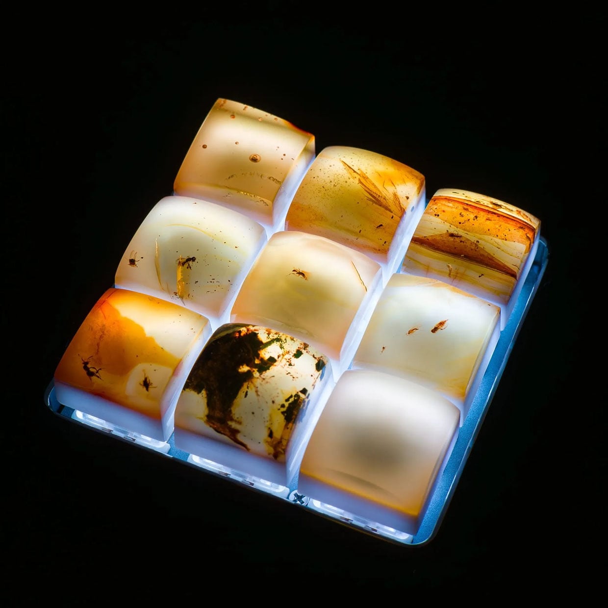 These Crazy Keycaps Are Handmade from Ancient Amber