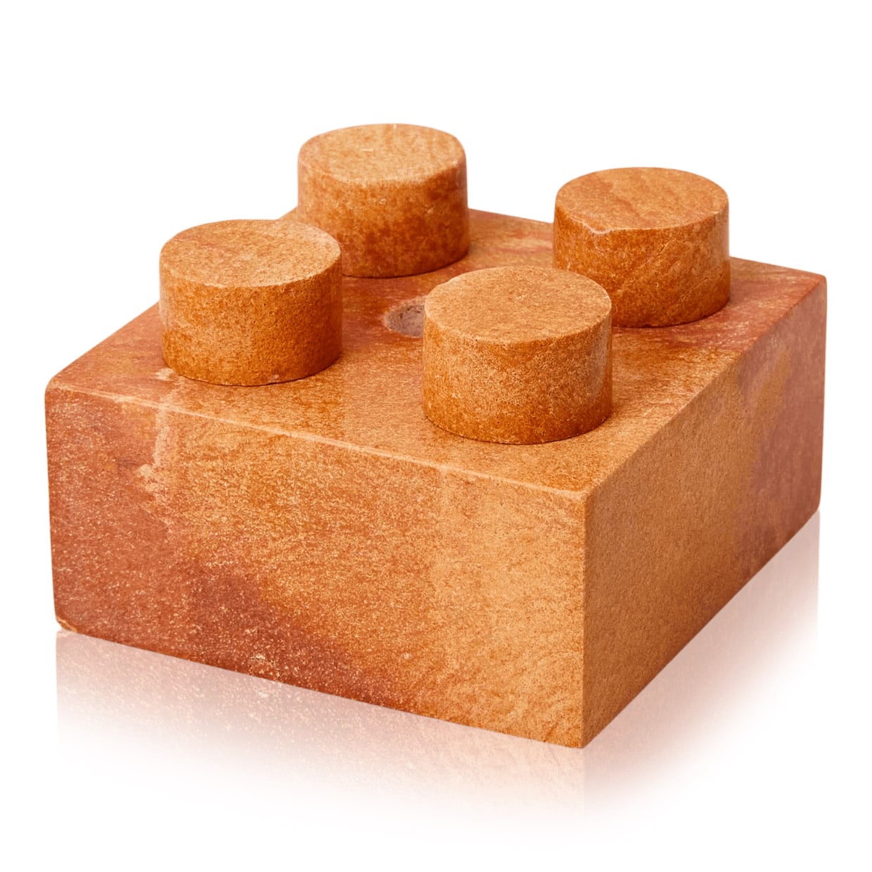 This Stone Phone Stand Looks Like a Giant LEGO Block