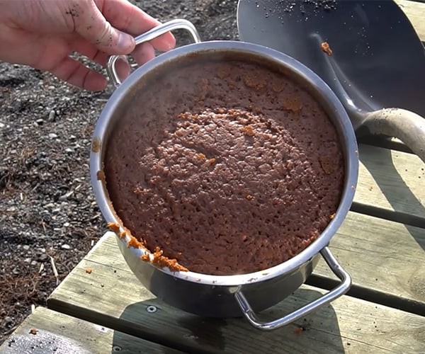 Baking Icelandic Bread Underground in Hot Volcanic Sand