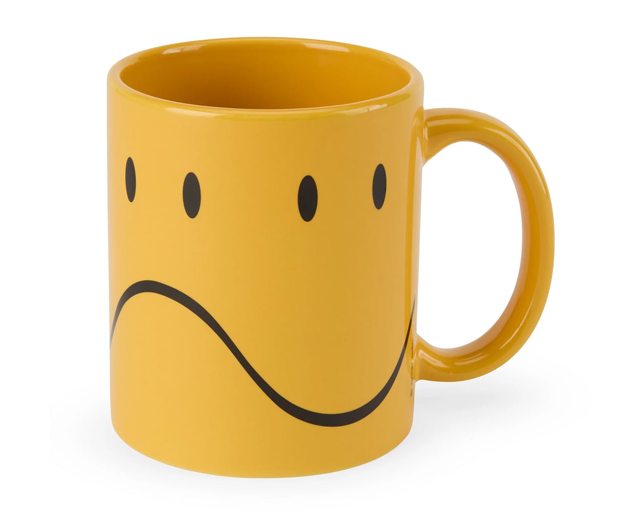 This Ceramic Coffee Mug Goes from Happy to Sad and Back Again