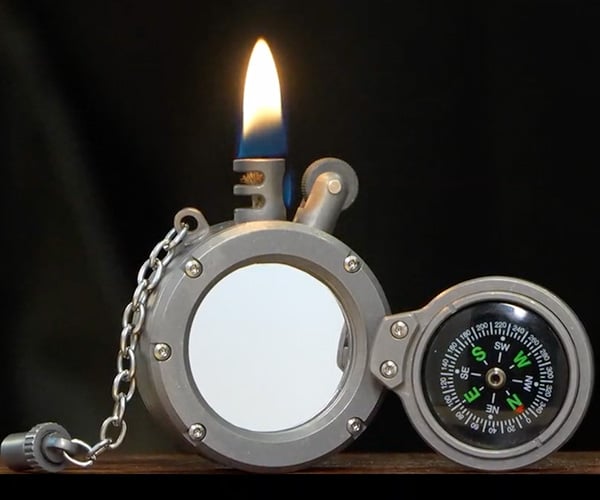 This Round Titanium Lighter Has Compass, Watch, Cache, and Loupe Modules