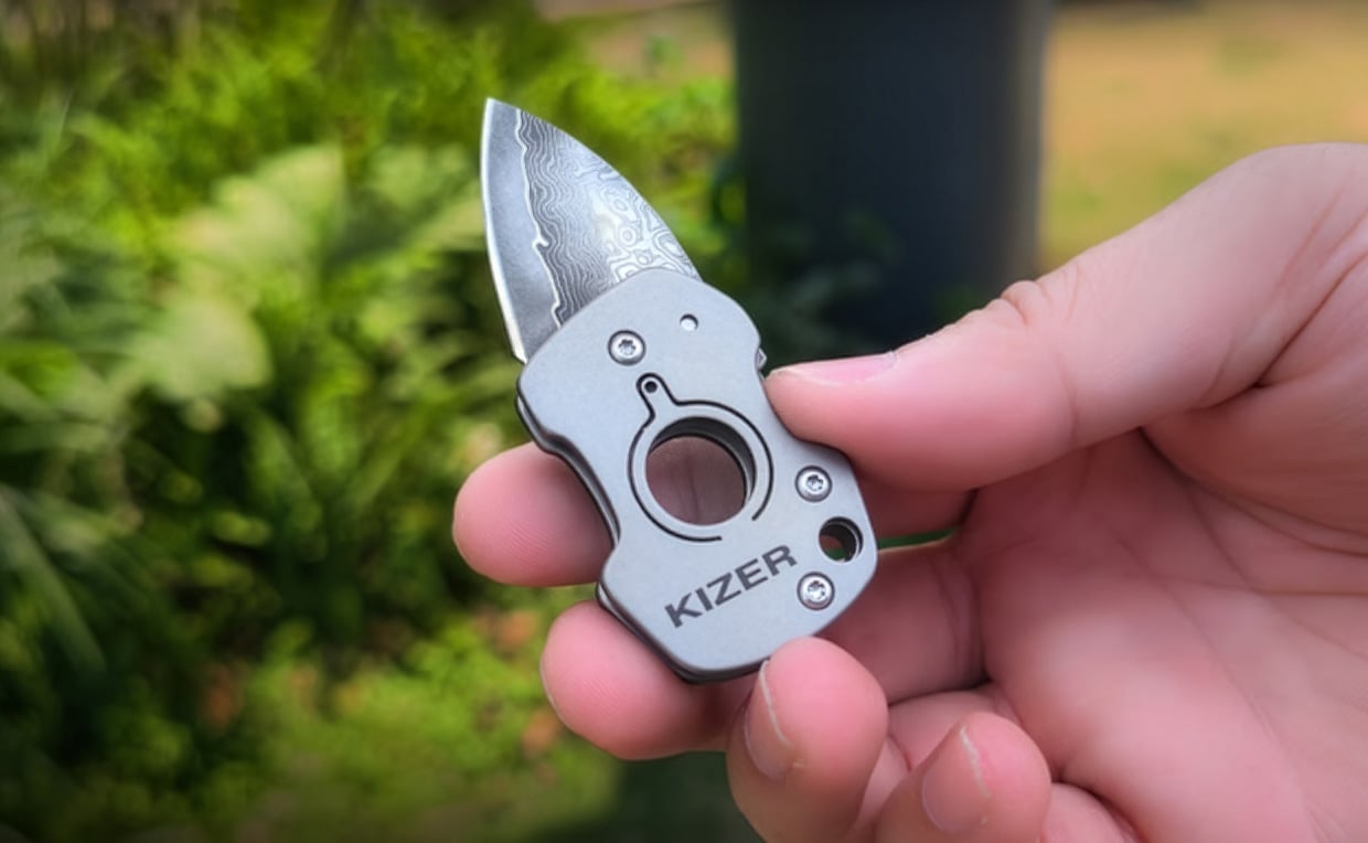 Kizer’s Stubby Titanium Knife Packs a Damascus Shark Fin Blade